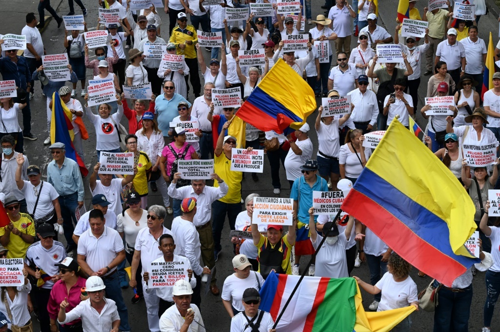 Thousands protest against Colombian president's reform plans