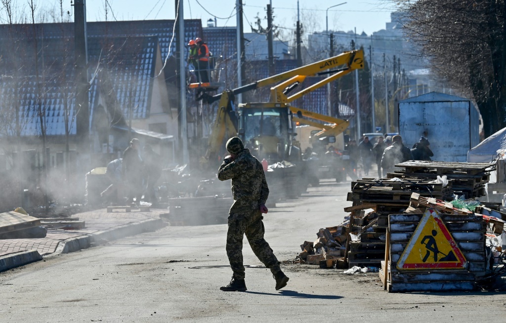 Ukraine's Bucha rebuilds, seeks justice for war killings