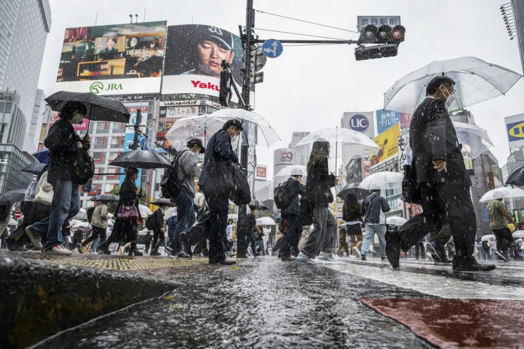 One dead, two missing in Japan after heavy rain